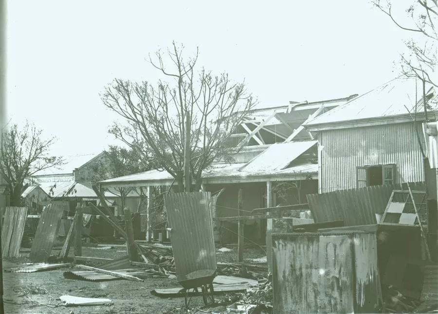 Buildings showing force of cyclone - AGSA Collection