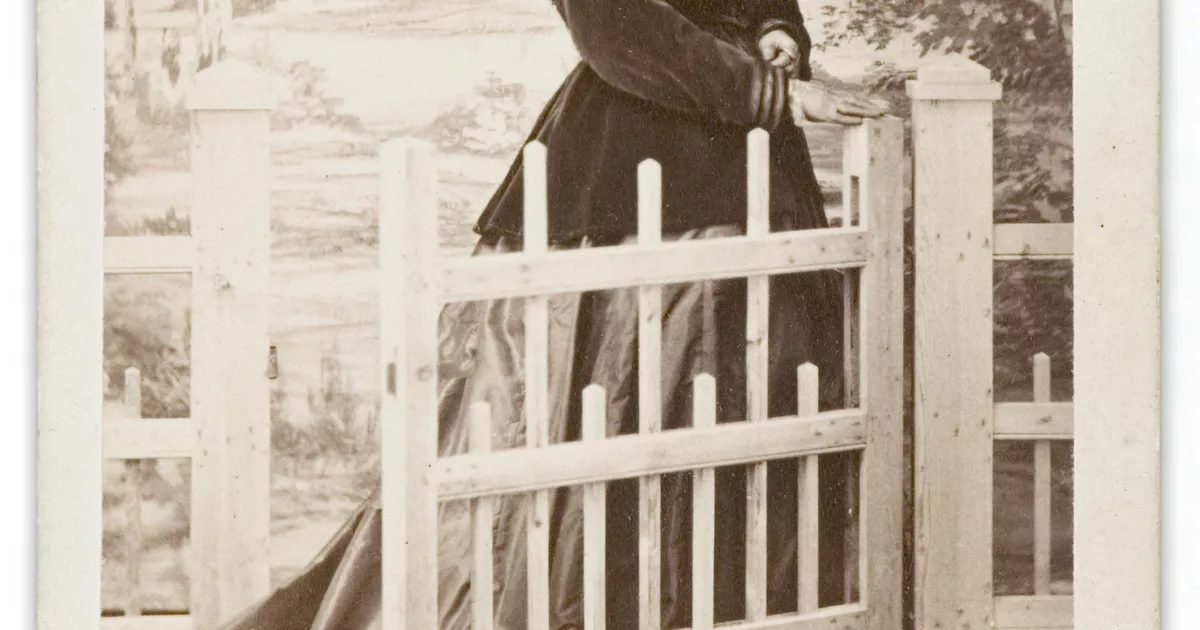 Portrait of woman against painted backdrop - AGSA Collection