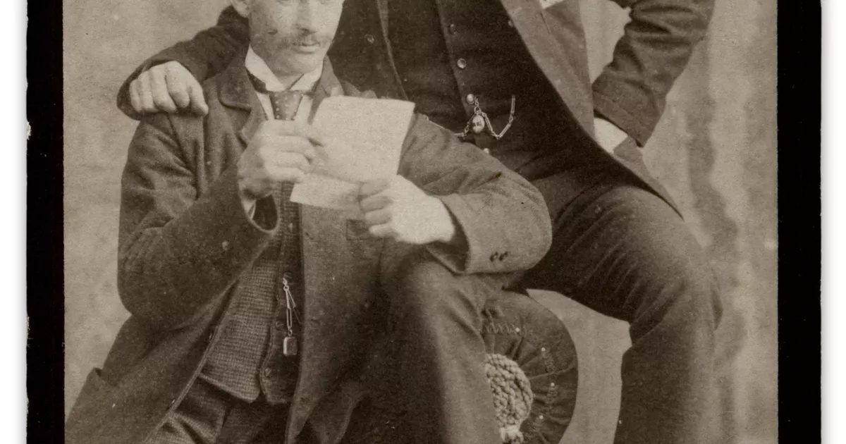 Portrait of two men reading a letter - AGSA Collection