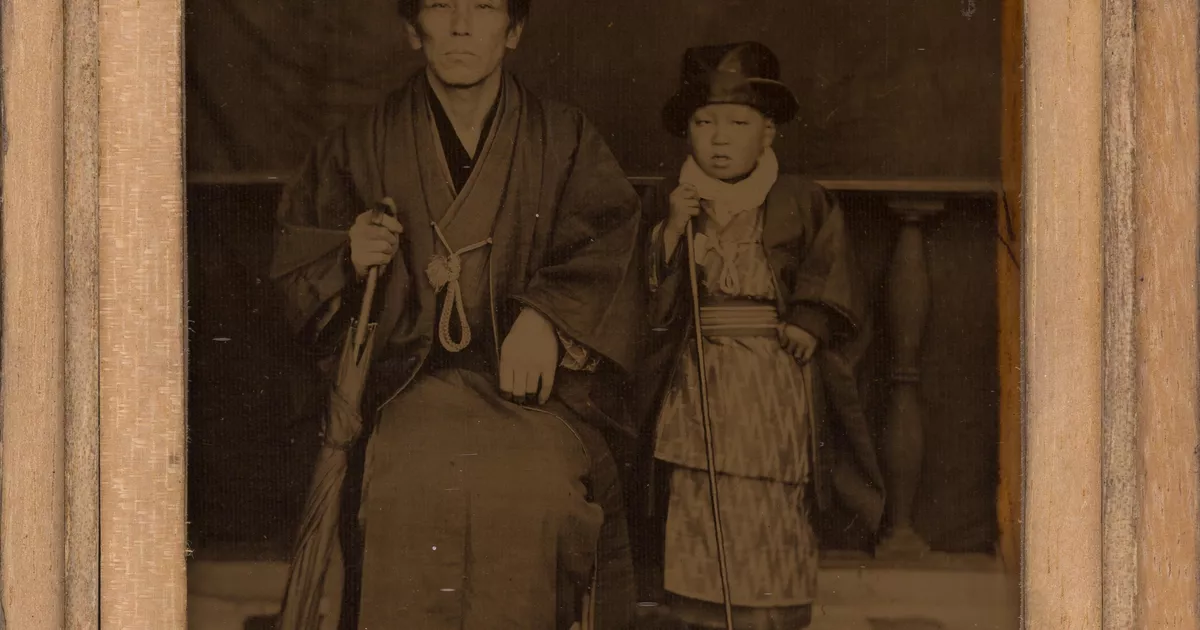 Umbrella man and young son - AGSA Collection