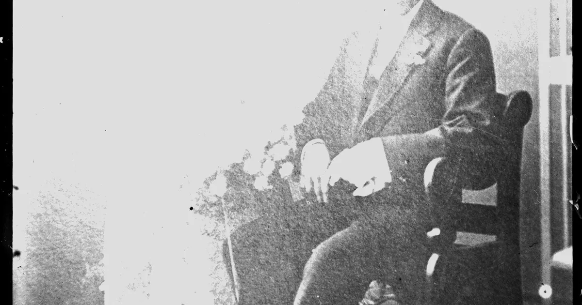 Overexposed wedding portrait, foot of bride in foreground at left ...