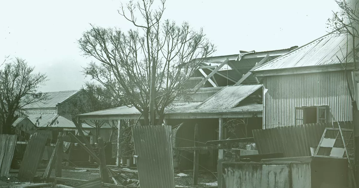 Buildings showing force of cyclone - AGSA Collection