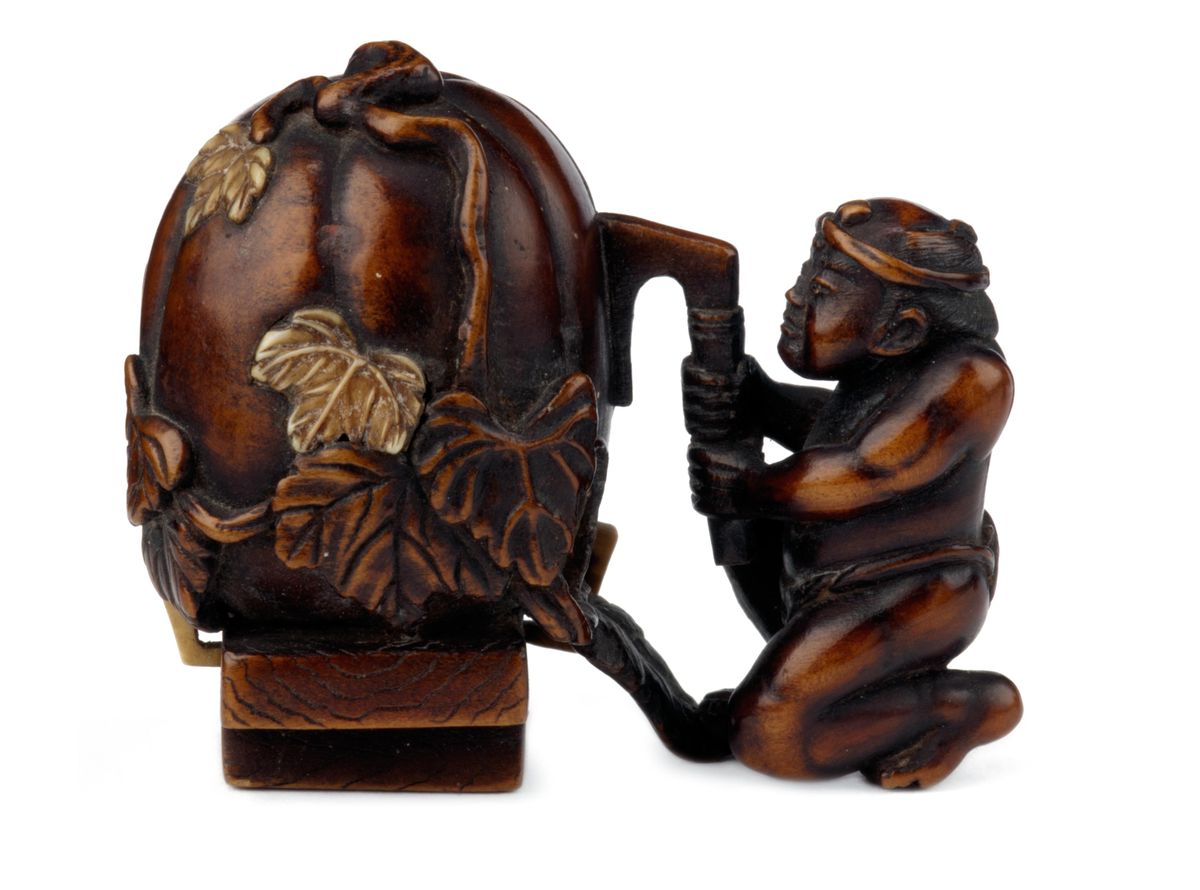 Netsuke, Man cutting large pumpkin - AGSA Collection