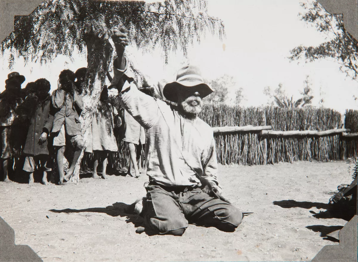 Arrernte man demonstrating spinning with spindle - AGSA Collection