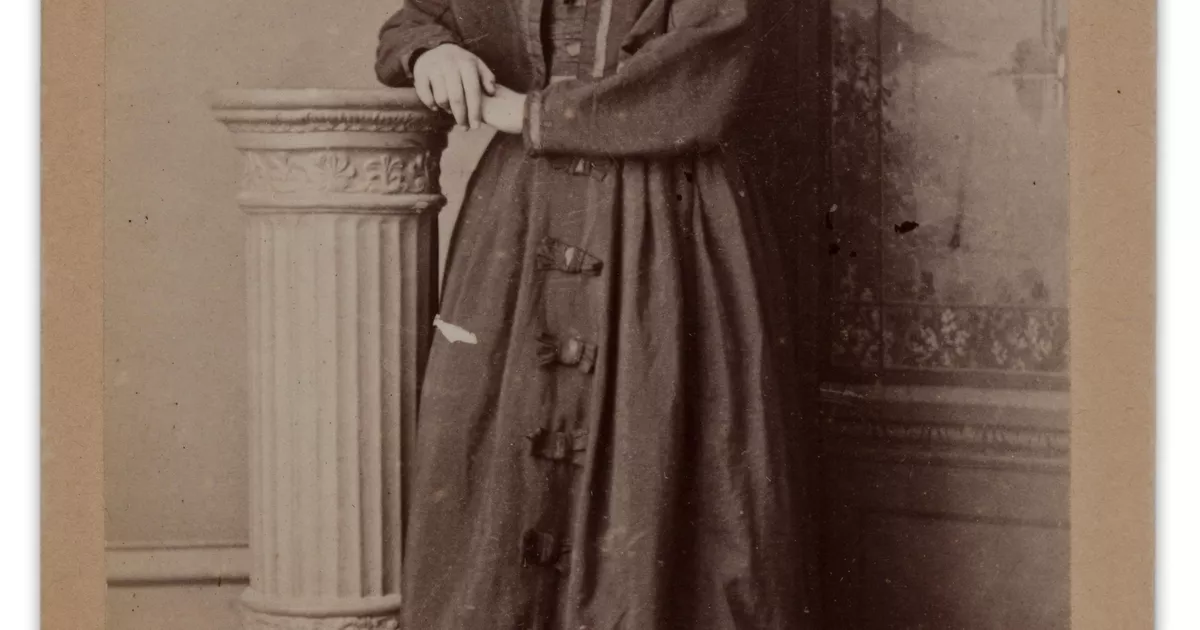 Studio portrait of Mary Jane Dellow (nee Marchant) with arm resting on ...