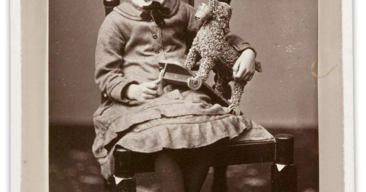 Portrait of child holding toy - AGSA Collection