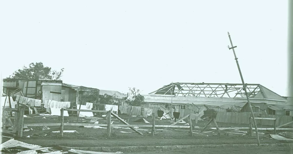 Buildings showing force of cyclone - AGSA Collection
